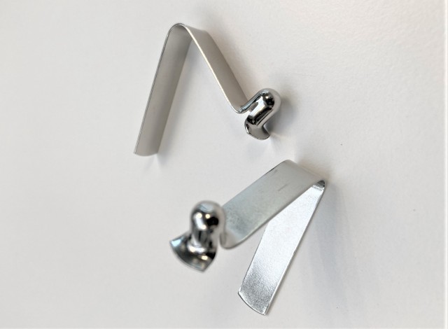 Spring for locking telescopic tubes